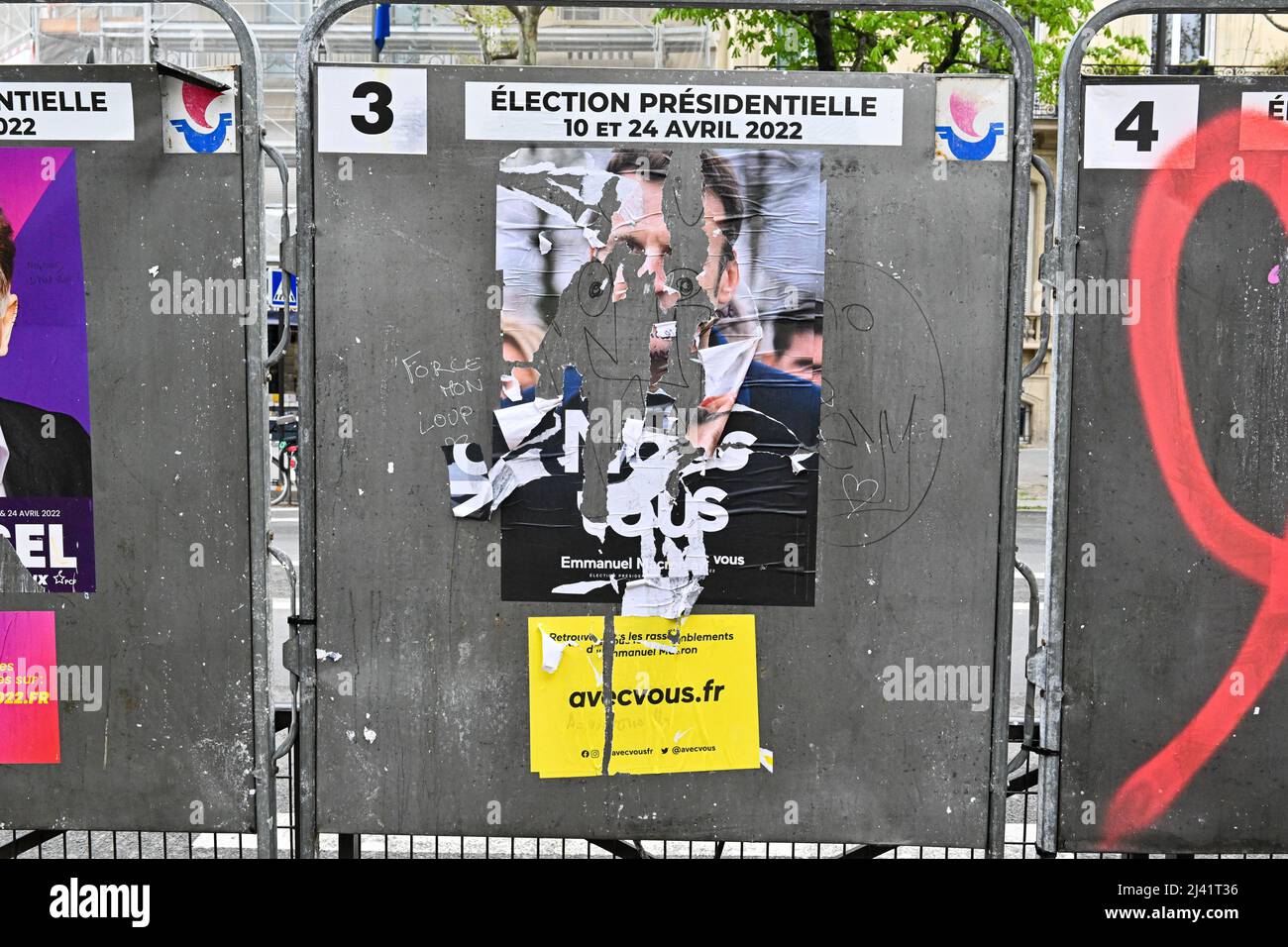 French Presidential election campaign posters of Emmanuel Macron and ...