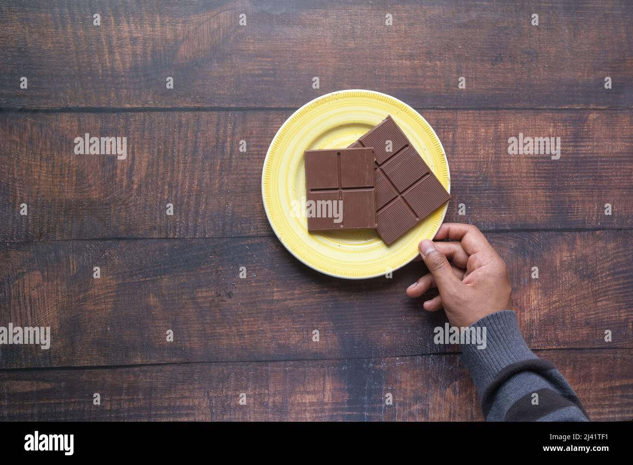 Hand pick dark chocolate candy hi-res stock photography and images - Alamy