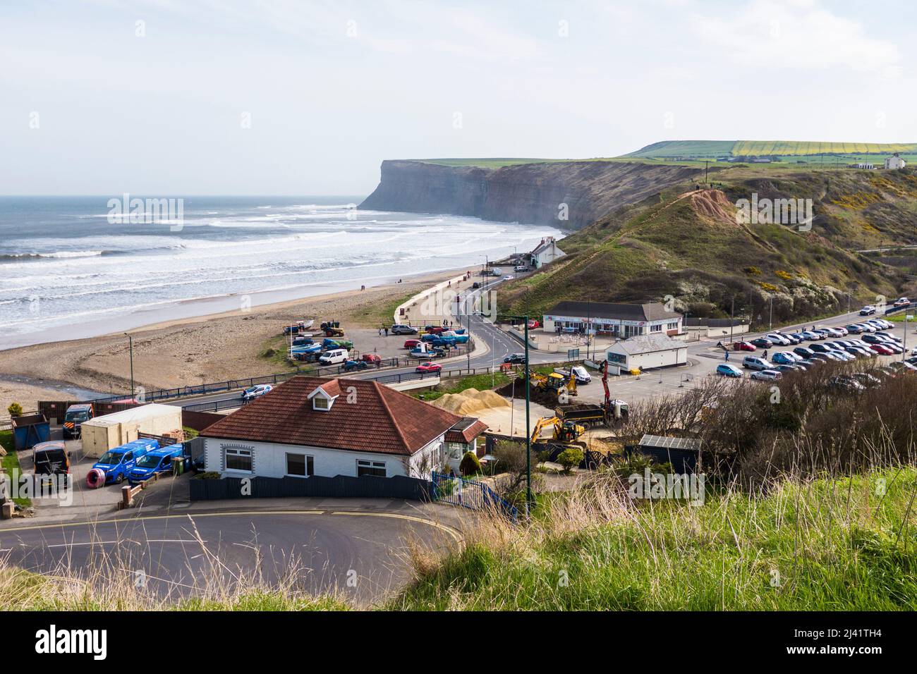 A cliff top view of the beach and Huntcliff at Saltburn by the Sea ...