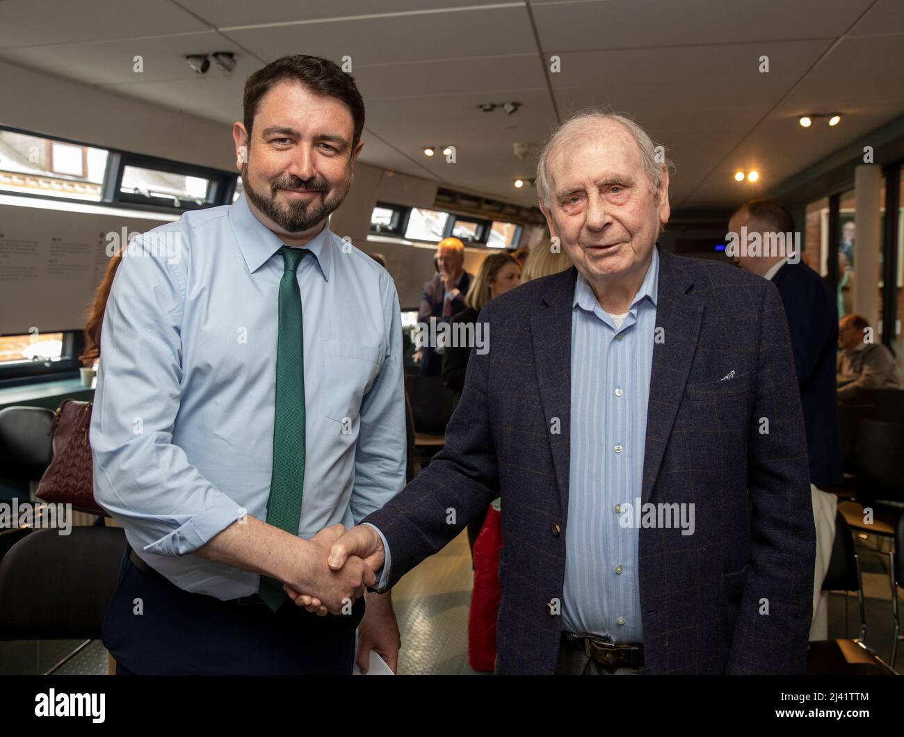 Former SDLP MP and MLA for West Belfast Joe Hendron (right) shaking the ...
