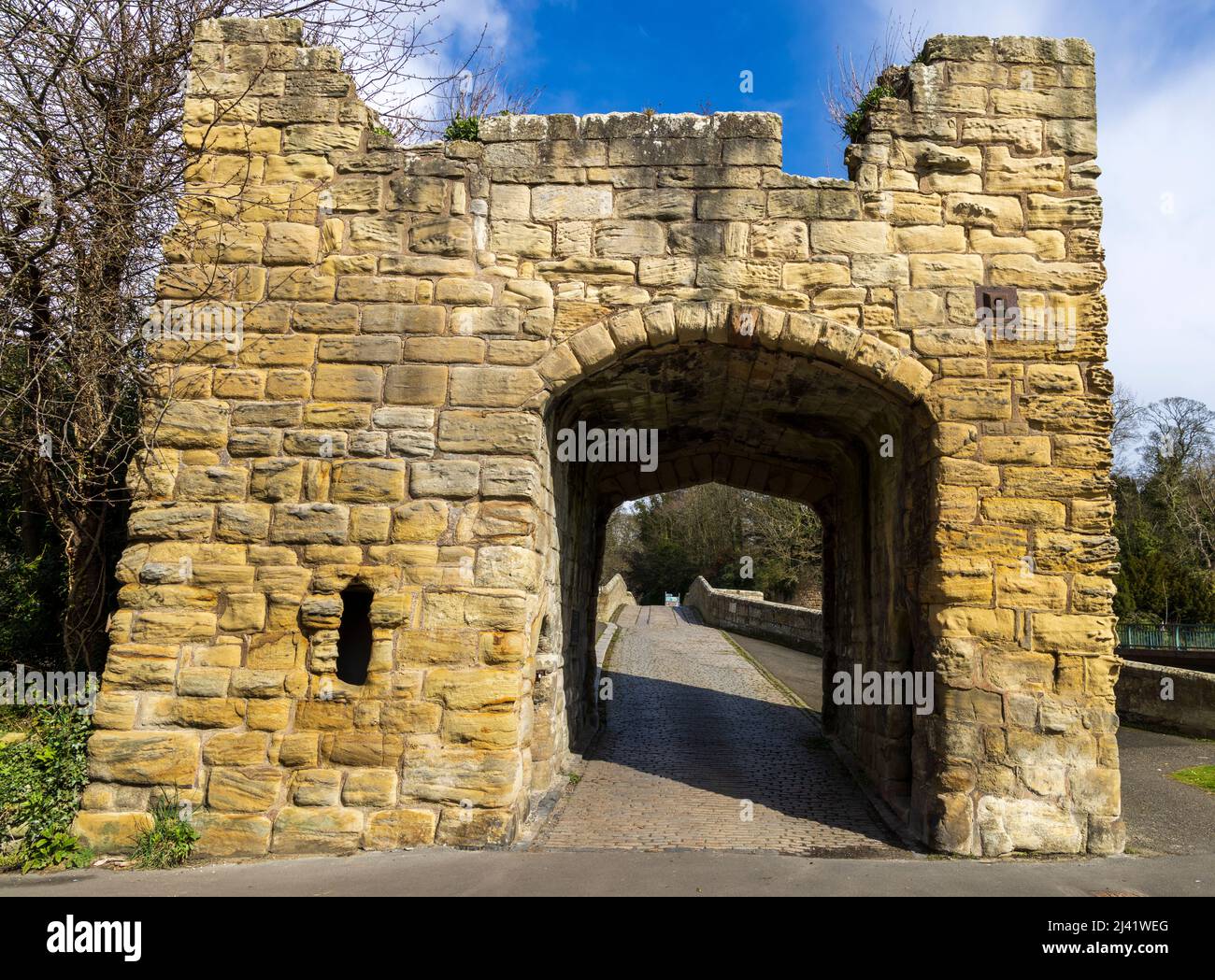 The 14th century fortified bridge over the River Coquet at Warkworth ...