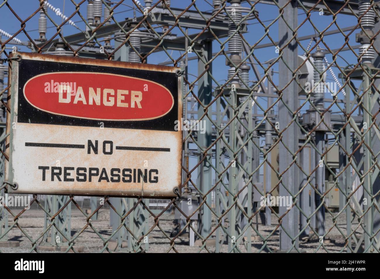DANGER - NO TRESPASSING sign at an electrical substation Stock Photo ...