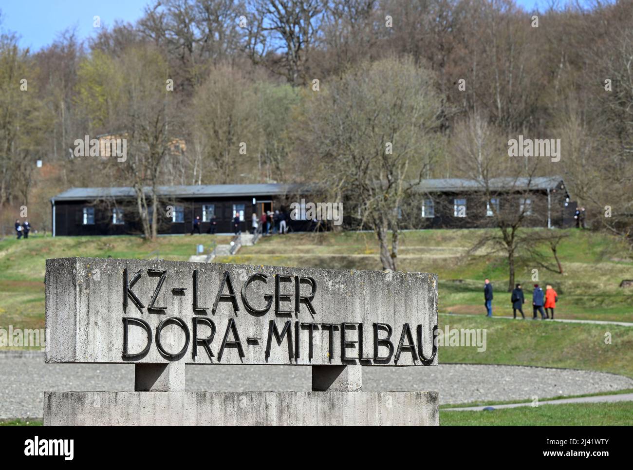Nordhausen, Germany. 11th Apr, 2022. Visitors walk to the commemoration ...