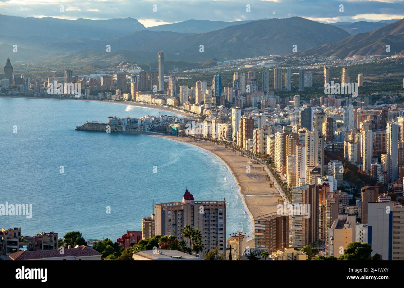 Beach of Benidorm city during sunset in Spain Stock Photo - Alamy