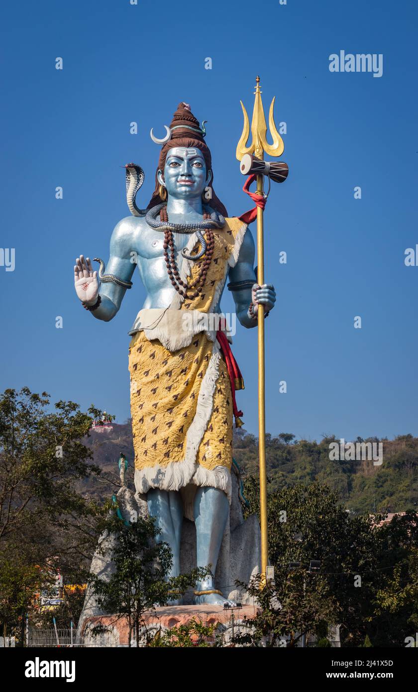 hindu god shiva statue with bright blue sky background at morning from ...