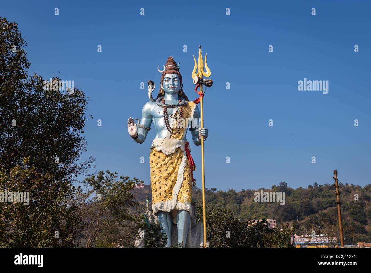 hindu god shiva statue with bright blue sky background at morning from ...