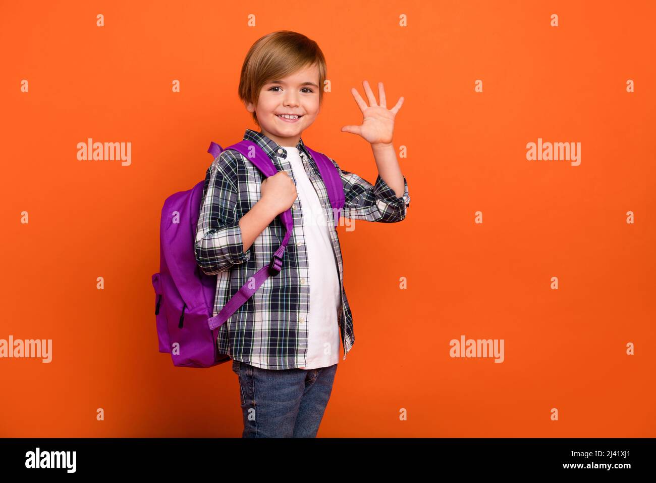 Profile side photo of young little boy waving hello meet friends ...