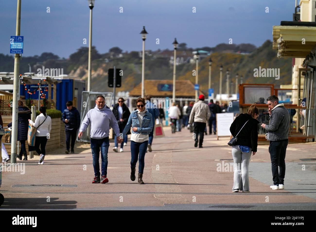 People on the promenade in Bournemouth. Picture date: Monday April 11 ...