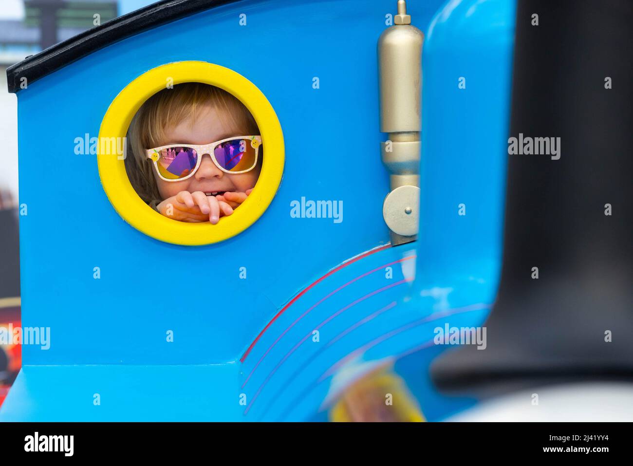 EDITORIAL USE ONLY Poppy aged 3 interacts with Thomas at London ...