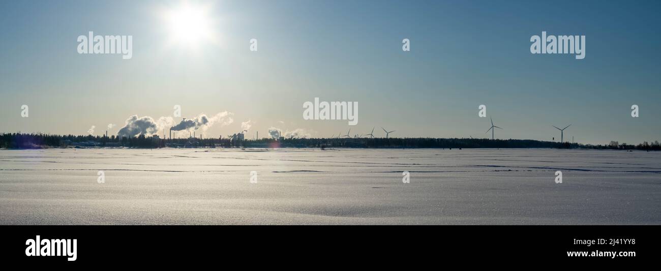 Steel factory and wind turbines Stock Photo - Alamy