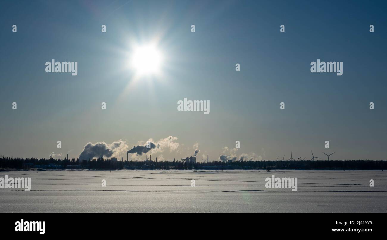 Steel factory and wind turbines Stock Photo - Alamy