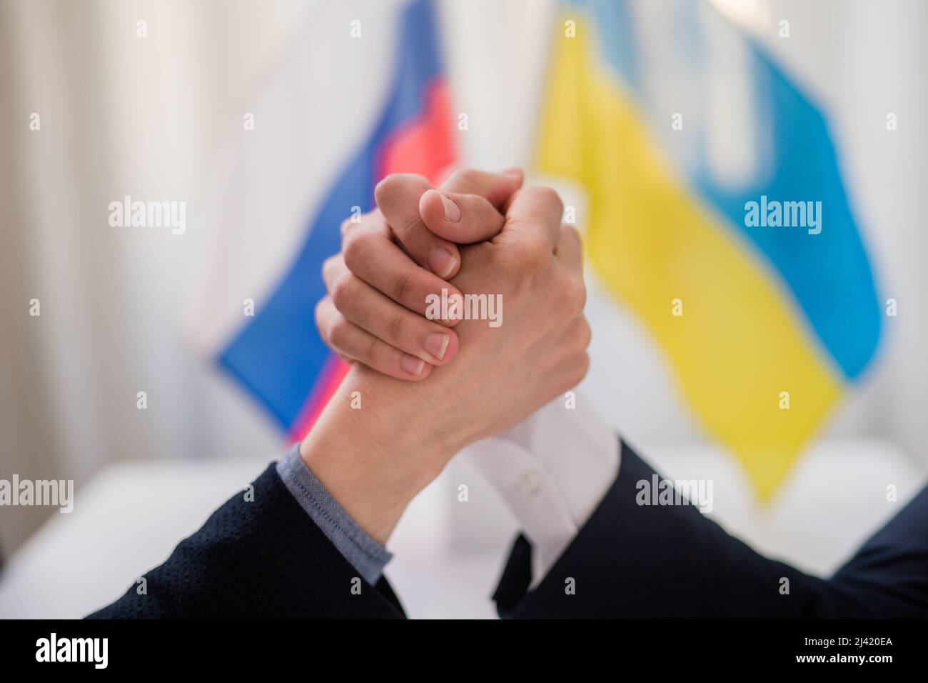 Representatives of Ukraine and Russia shaking hands, Ukraine peace ...