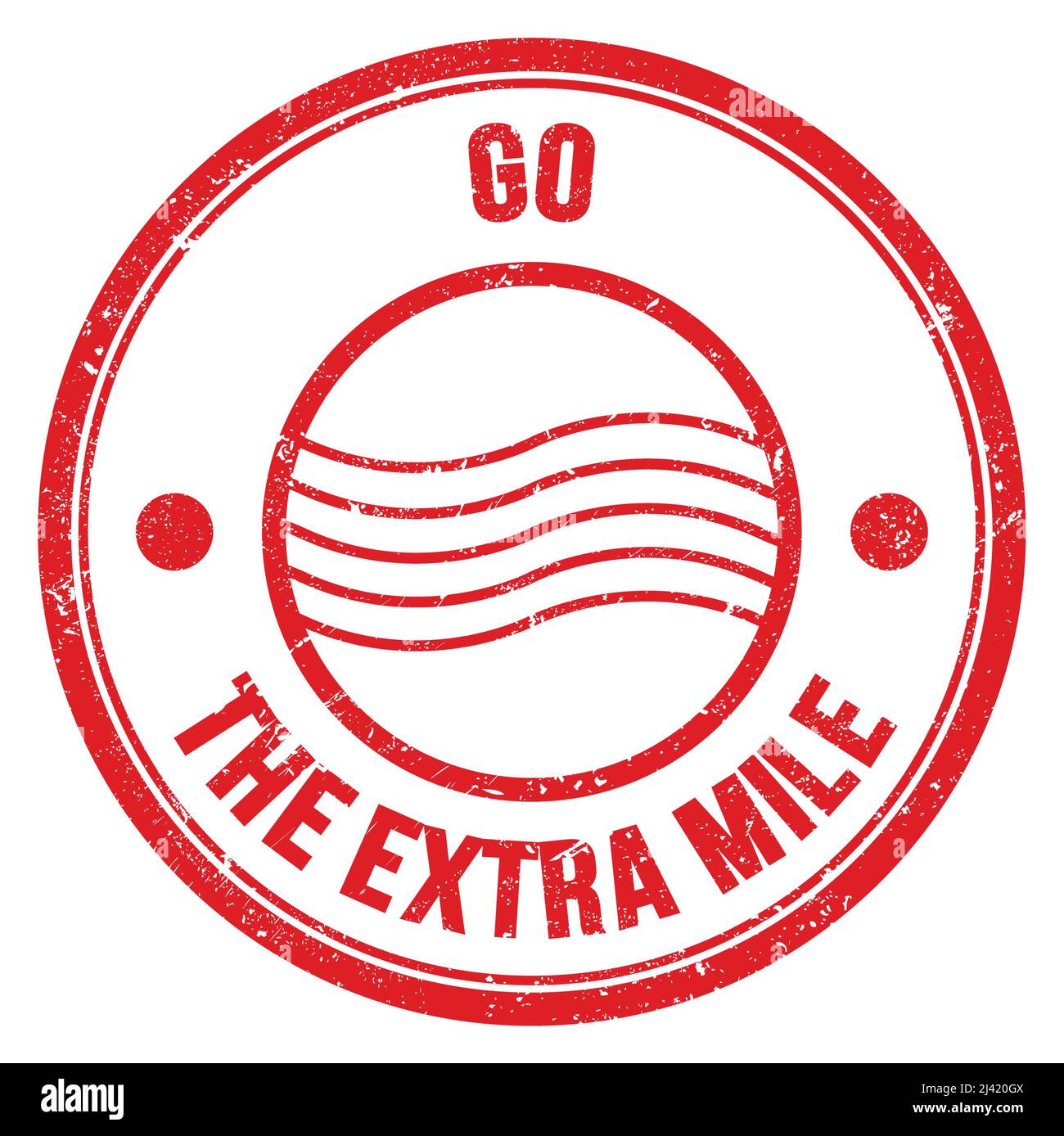 GO THE EXTRA MILE text written on red round postal stamp sign Stock ...