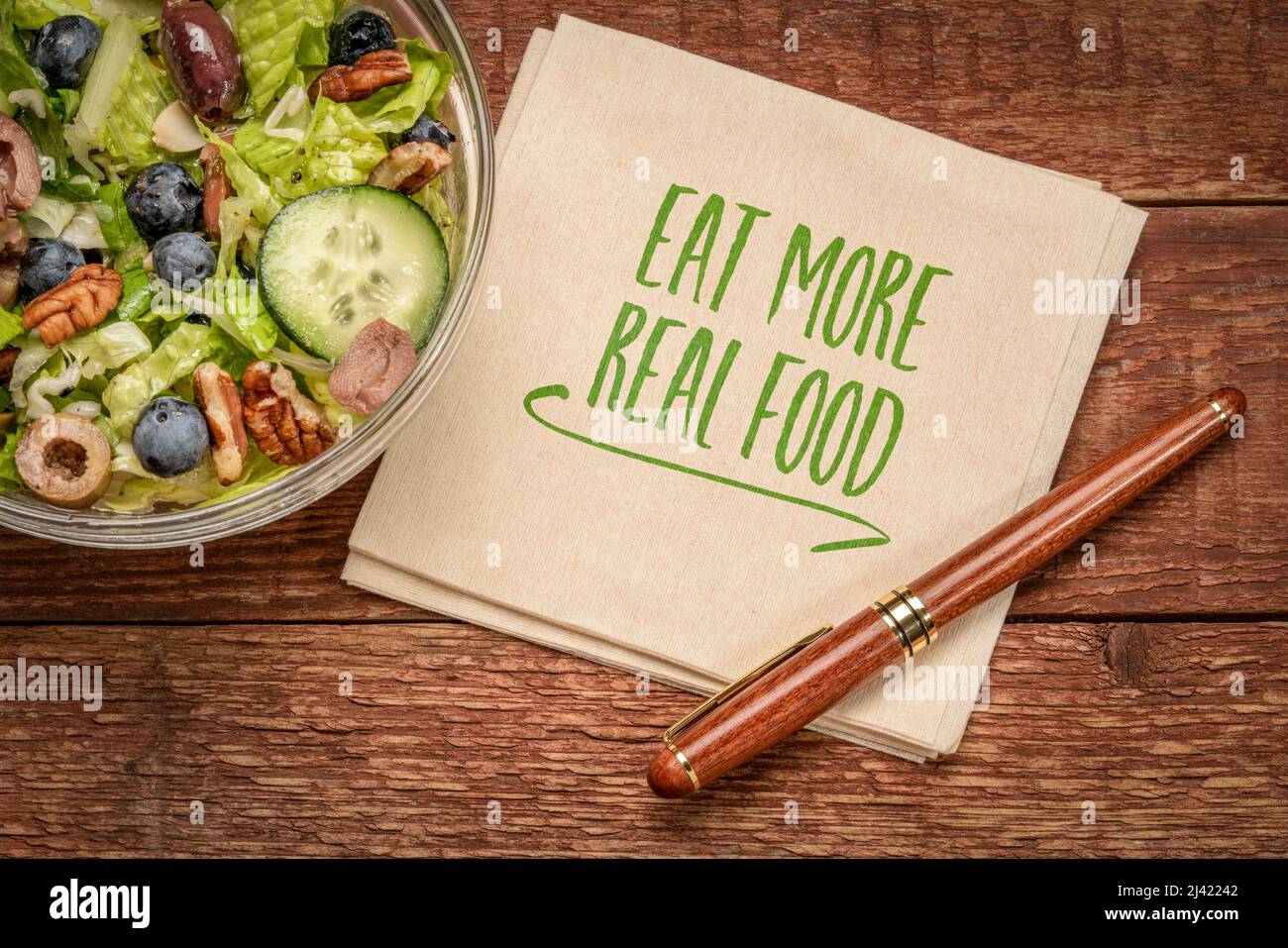 Eat more real food reminder - handwriting on a napkin with a bowl of ...