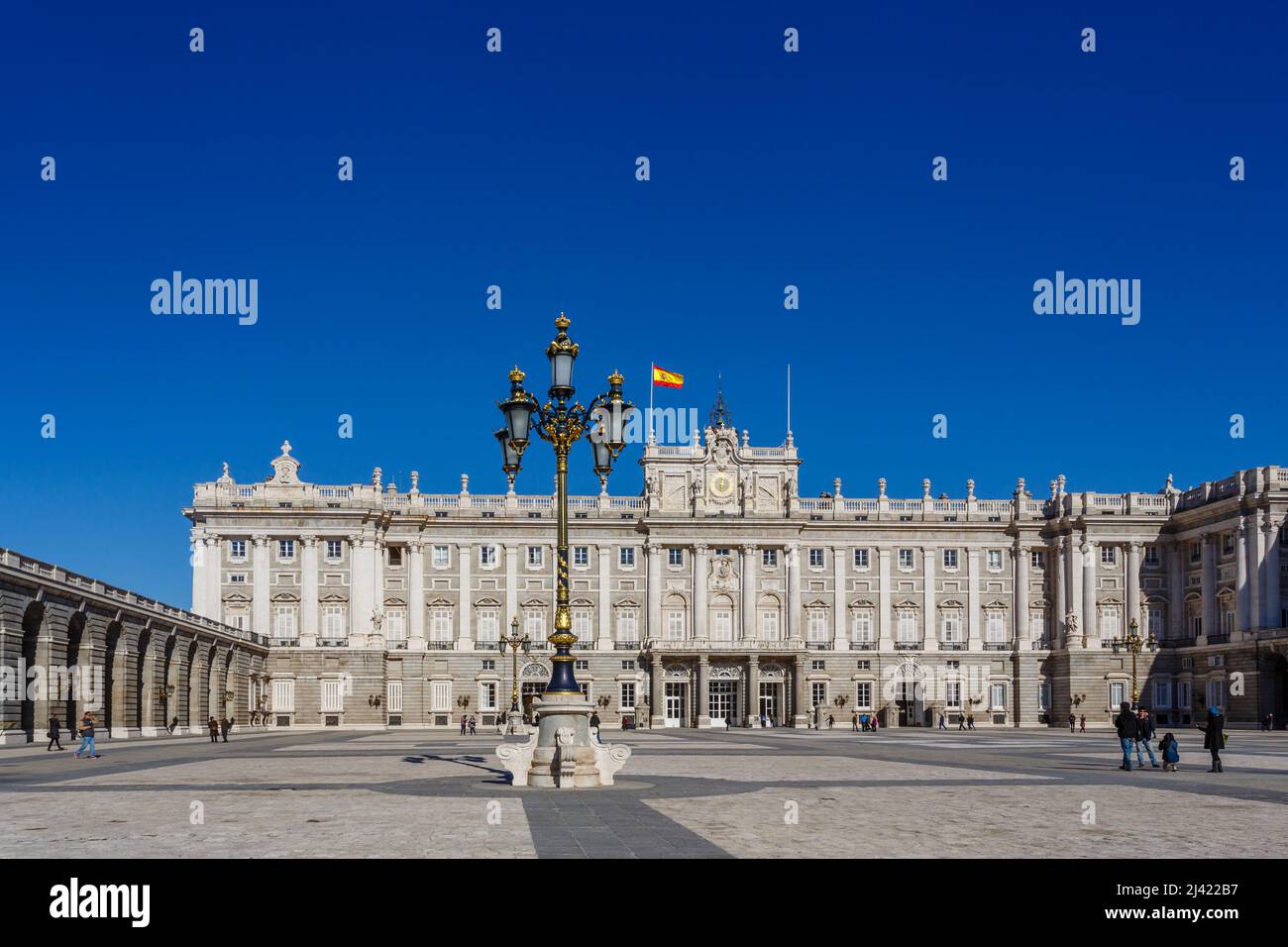 Ornate gilded lamp post in the courtyard of the baroque architecture ...