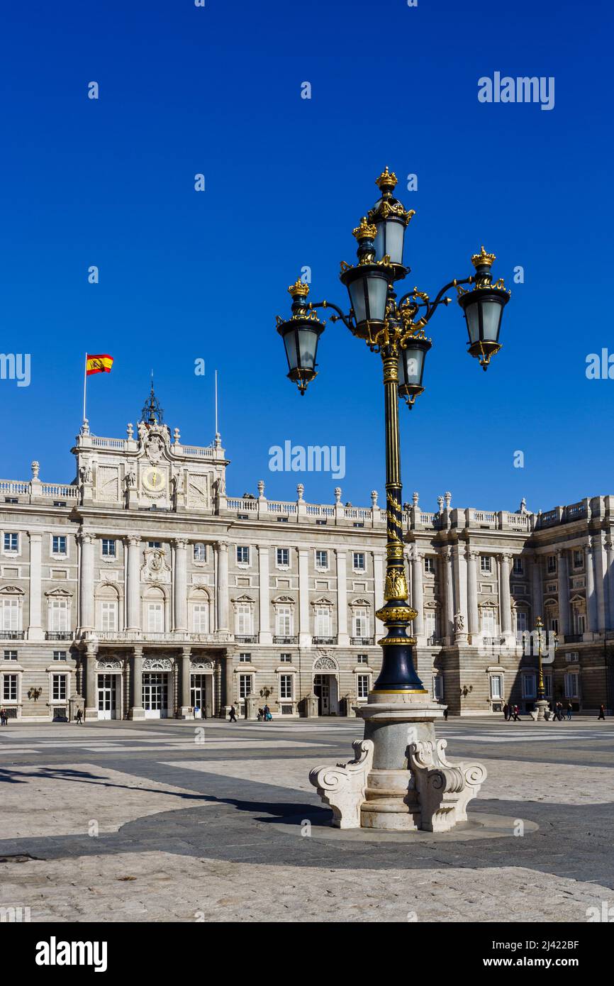 Ornate gilded lamp post in the courtyard of the baroque architecture ...