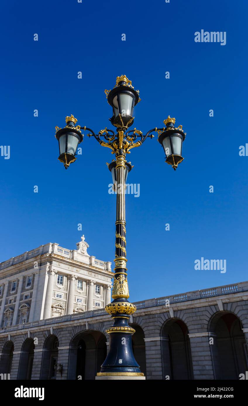 Ornate gilded lamp post in the courtyard of the baroque architecture ...