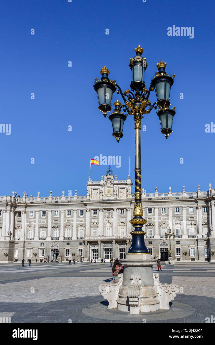 Ornate gilded lamp post in the courtyard of the baroque architecture ...