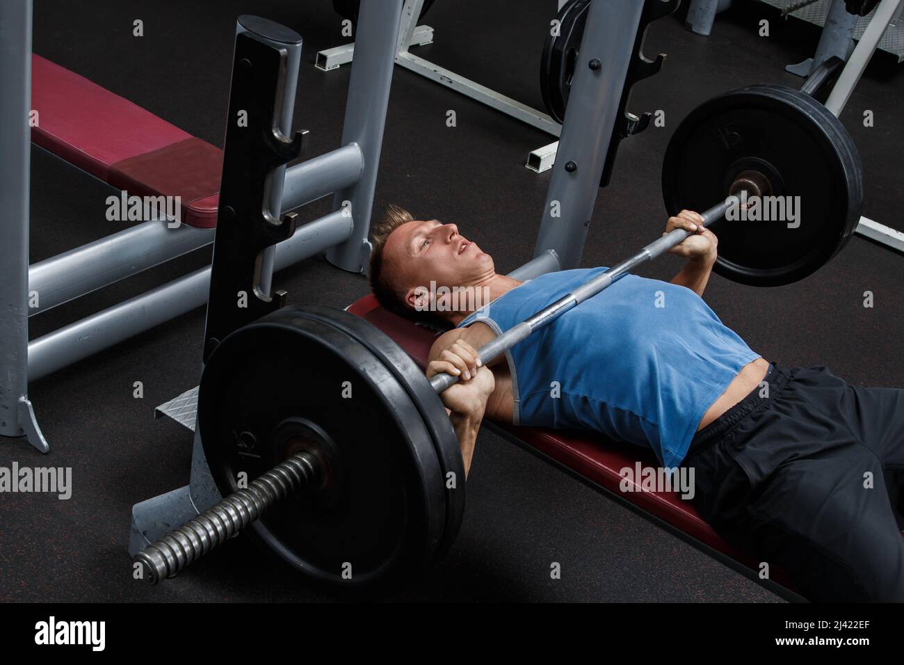 Muscular man during workout hi-res stock photography and images - Alamy