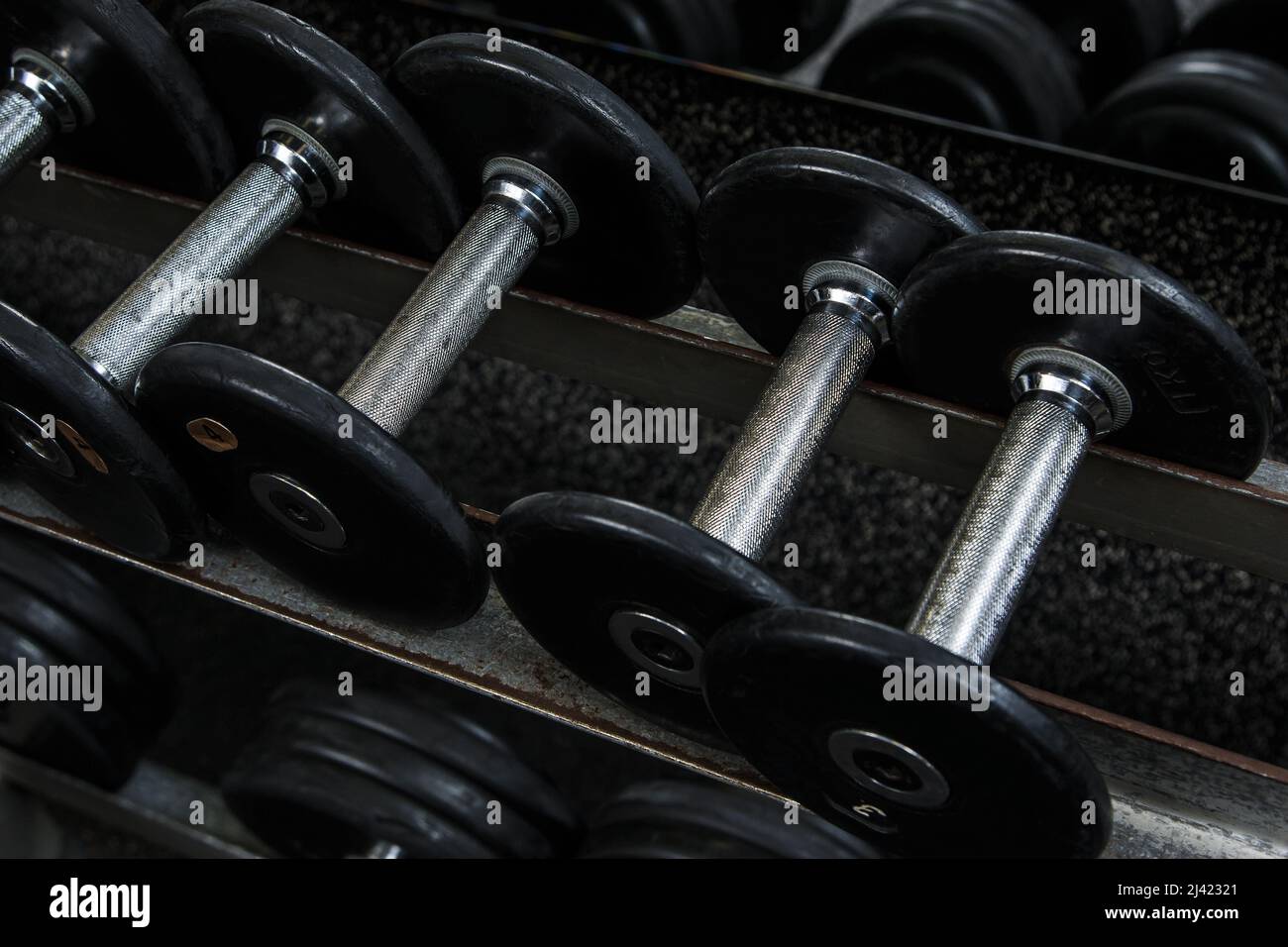 Different dumbbells hi-res stock photography and images - Alamy