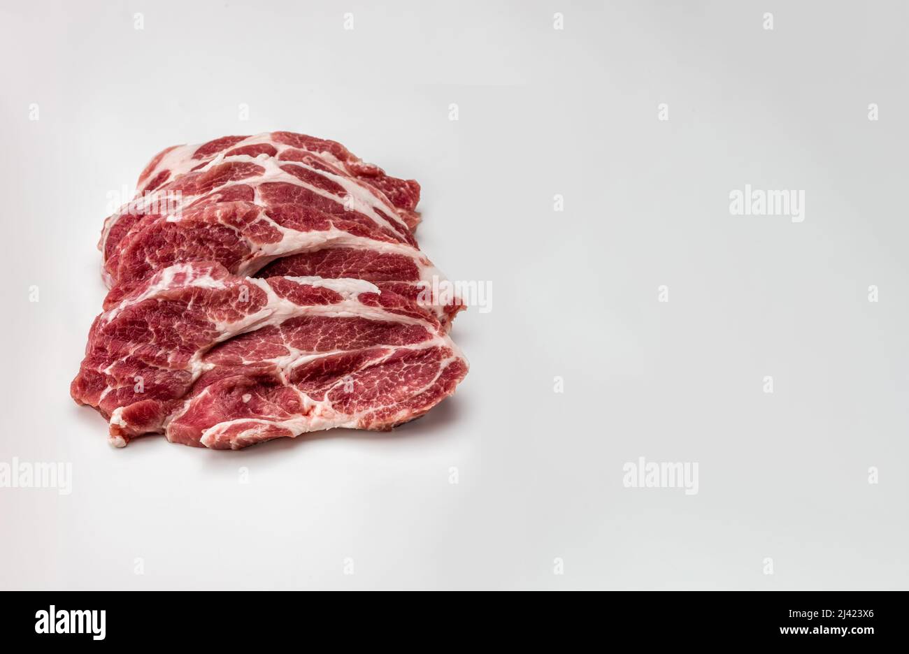 Fresh pork steaks. front view. Slices pork loin on gray background. raw ...