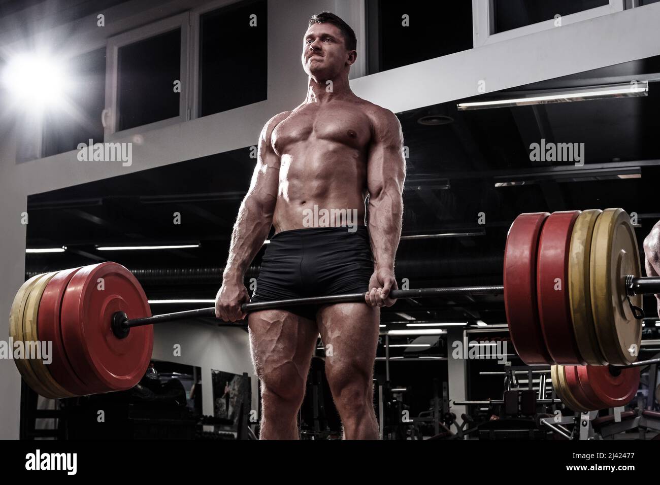 Strong man doing deadlift exercise in the gym Stock Photo - Alamy