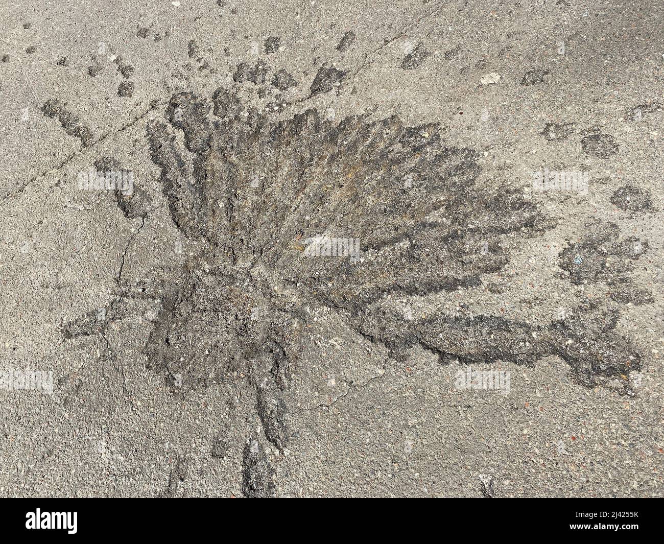 track on asphalt from forbidden cassette bomb explosion Stock Photo - Alamy