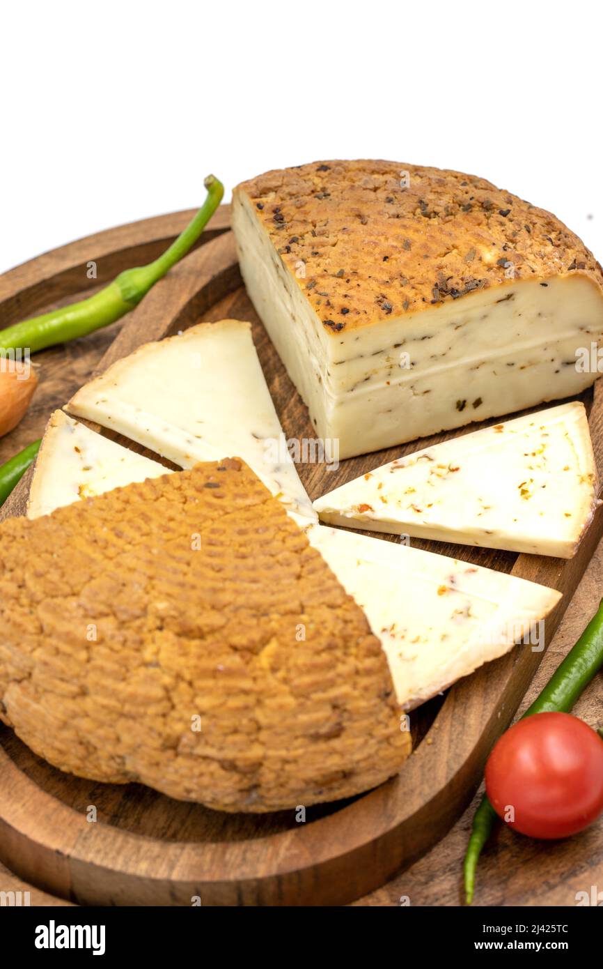 Smoked cheese on a white background. Delicious assortment of cheeses ...