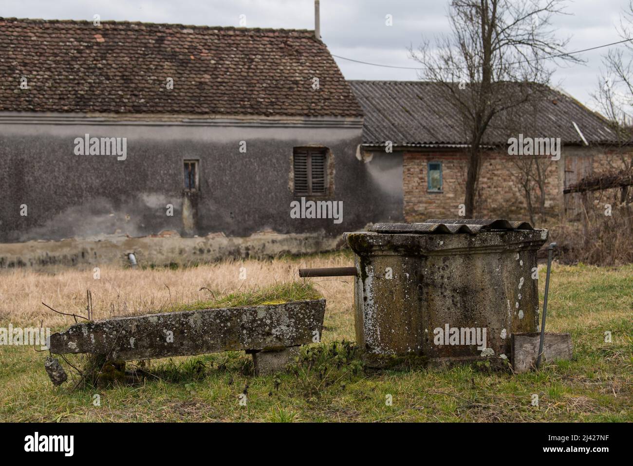 An old well at the farm. Well for drawing water located in the ...