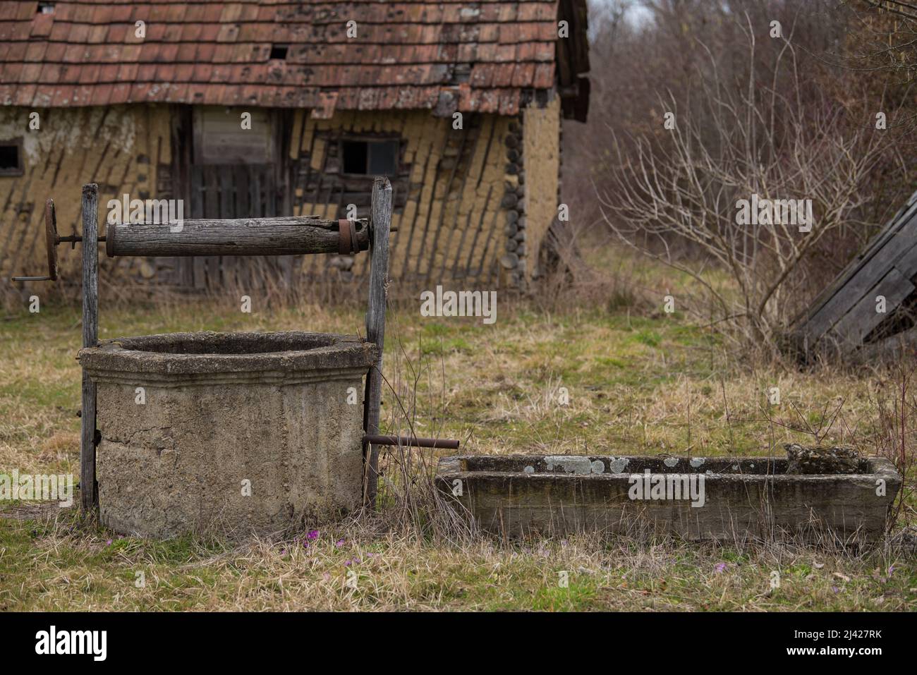 An old well at the farm. Well for drawing water located in the ...