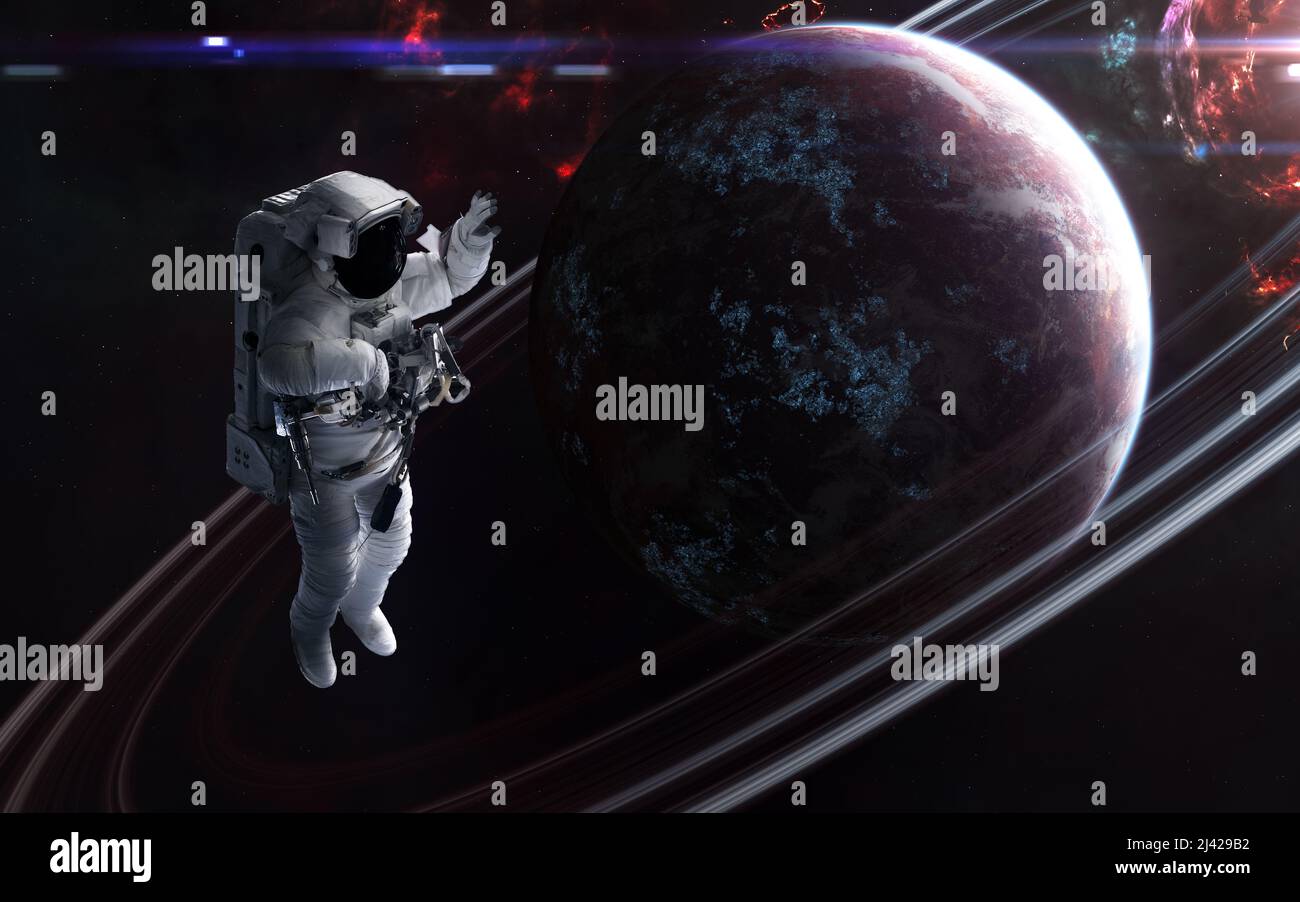 Astronaut, planet, beautiful space landscape Stock Photo - Alamy