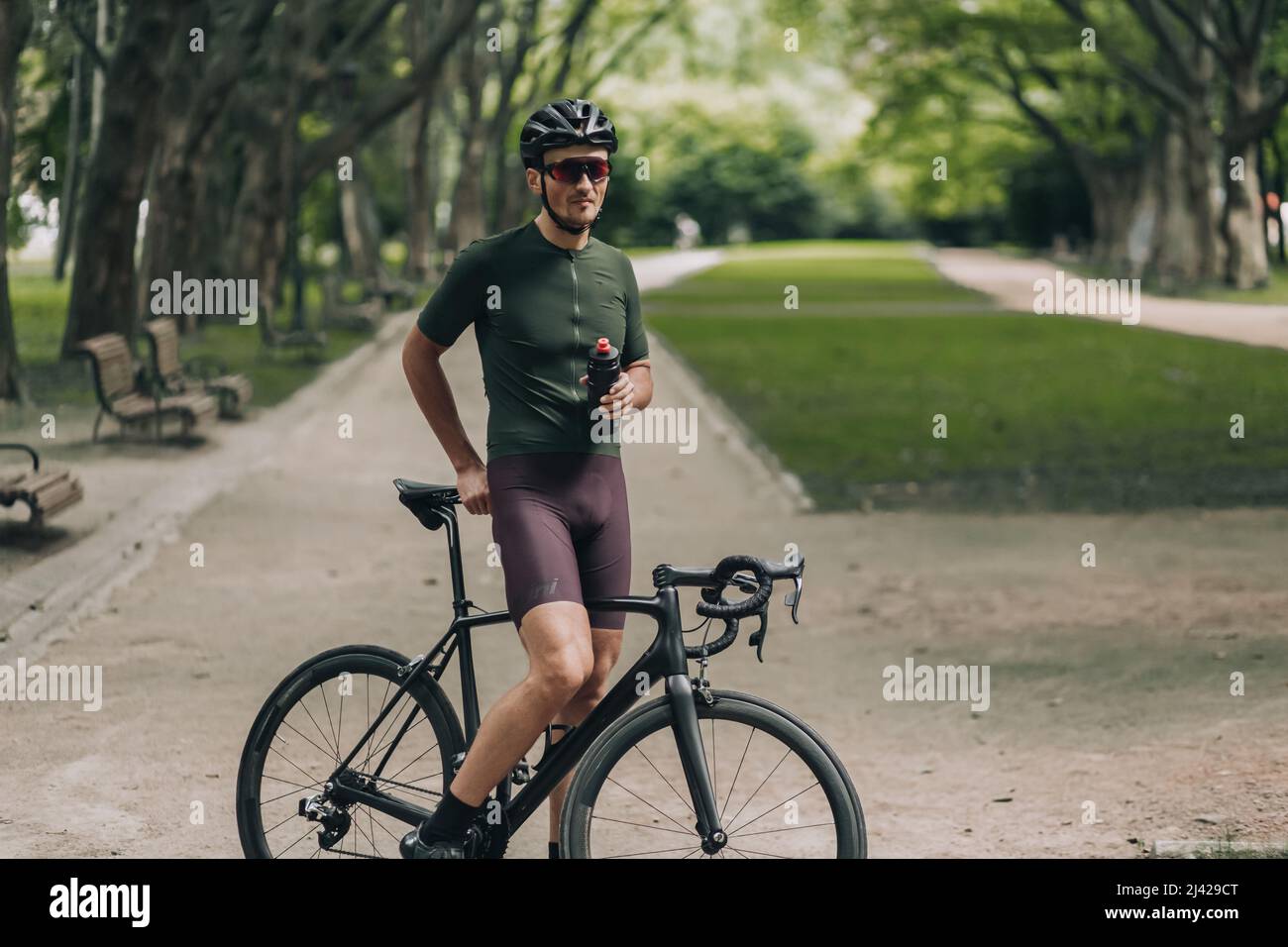 Professional cyclist drinking water from hi-res stock photography and ...