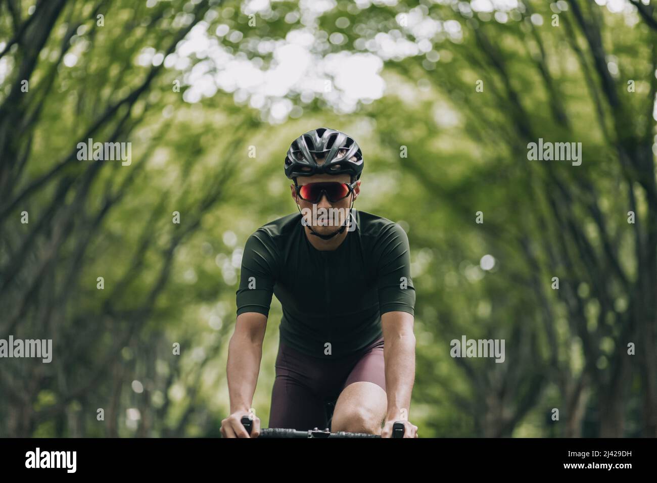 Cycling alone hi-res stock photography and images - Alamy