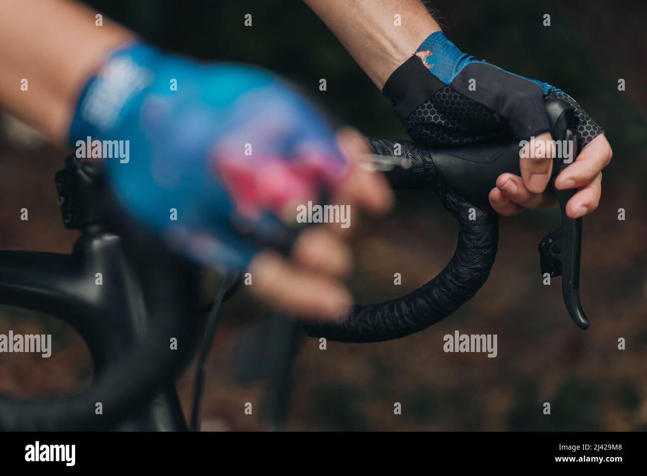 Hands holding handlebar bicycle hi-res stock photography and images - Alamy