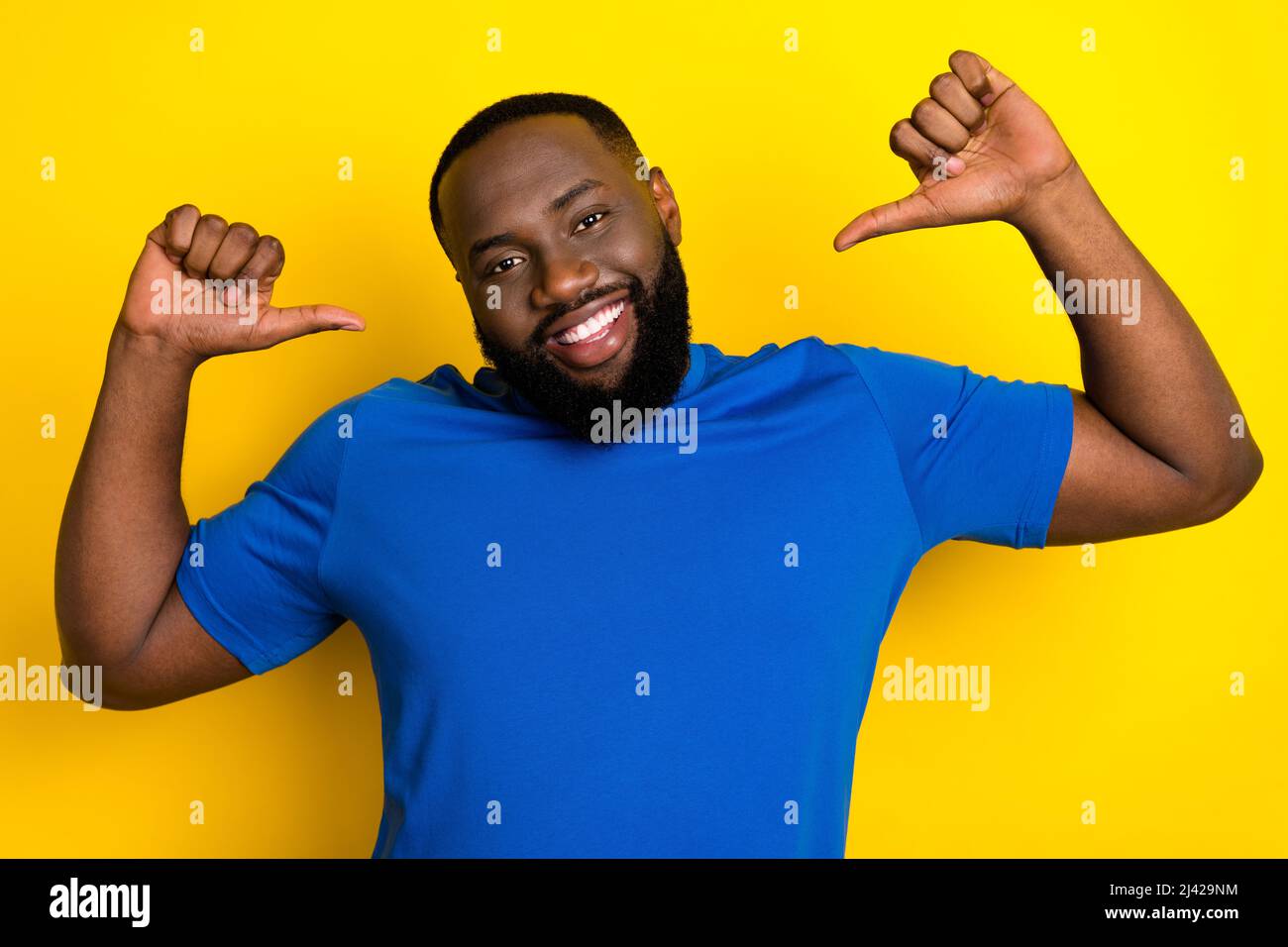 Portrait of attractive cheerful lucky guy demonstrating himself best ...