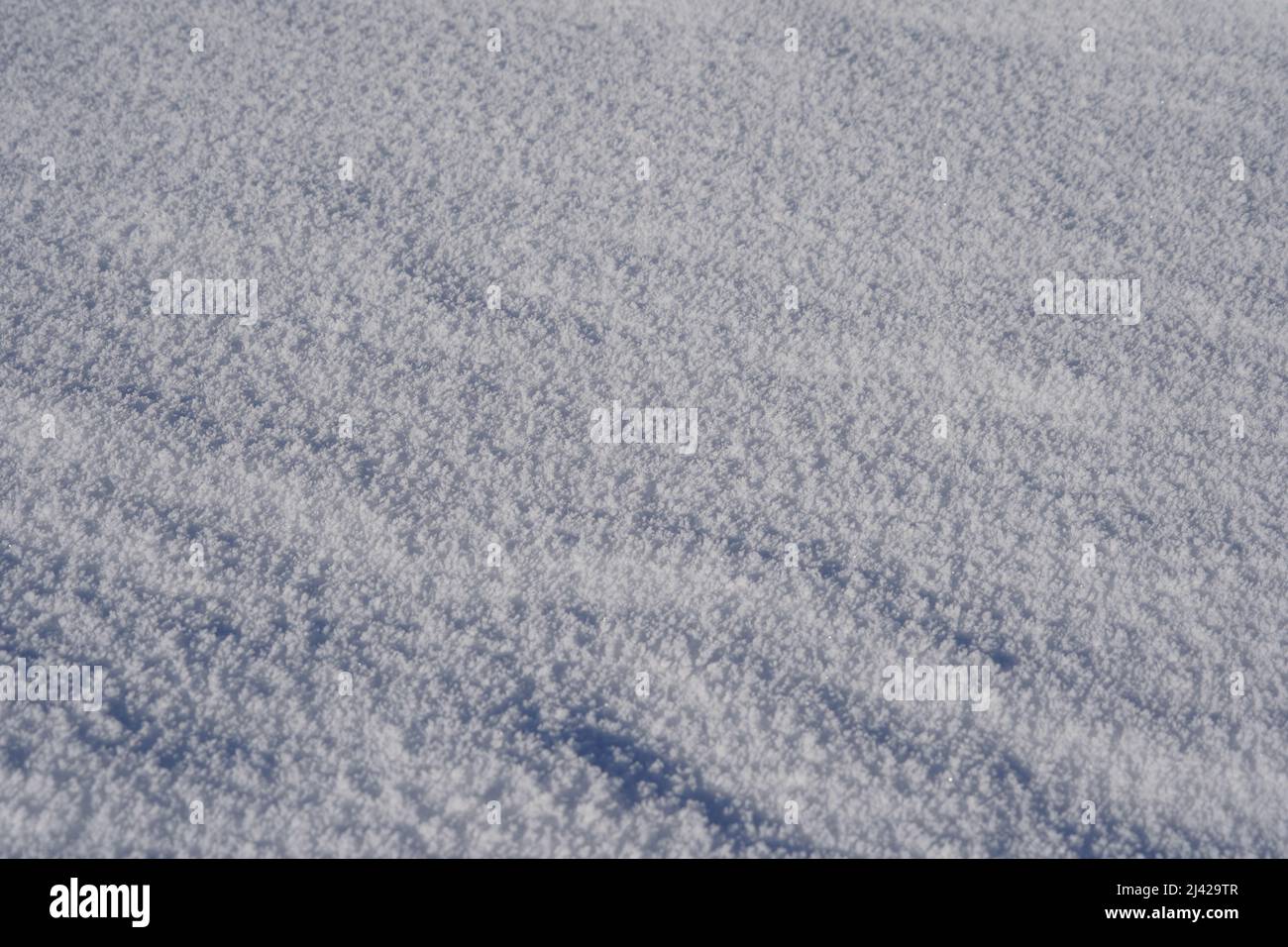 Snow covered field as winter background. Cutout of snow covered ...