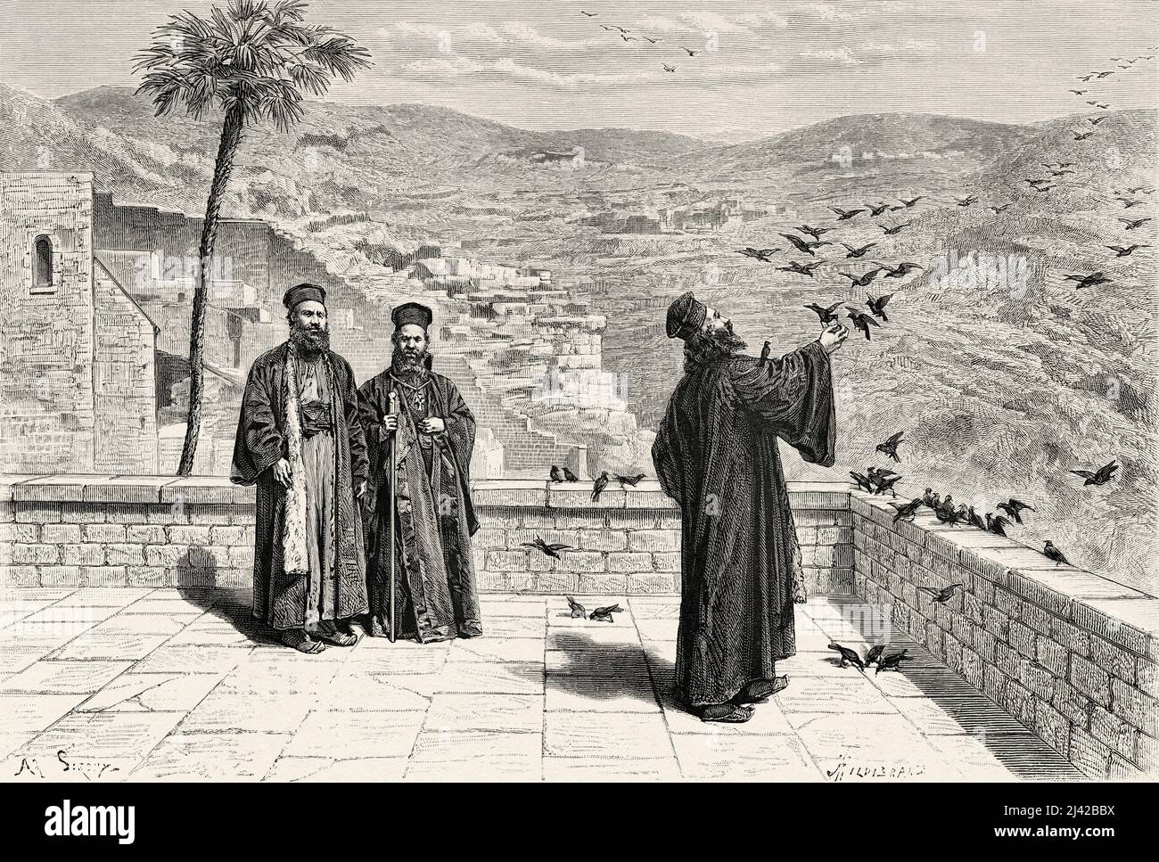 Monks feeding blackbirds at Mar Saba Greek Orthodox monastery, Kidron ...