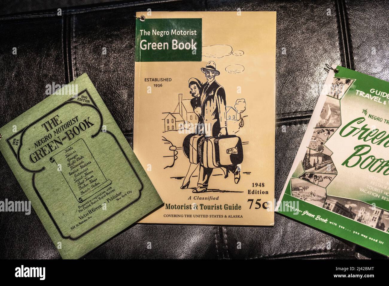 three different Green Book covers used by Negro motorist to know where ...