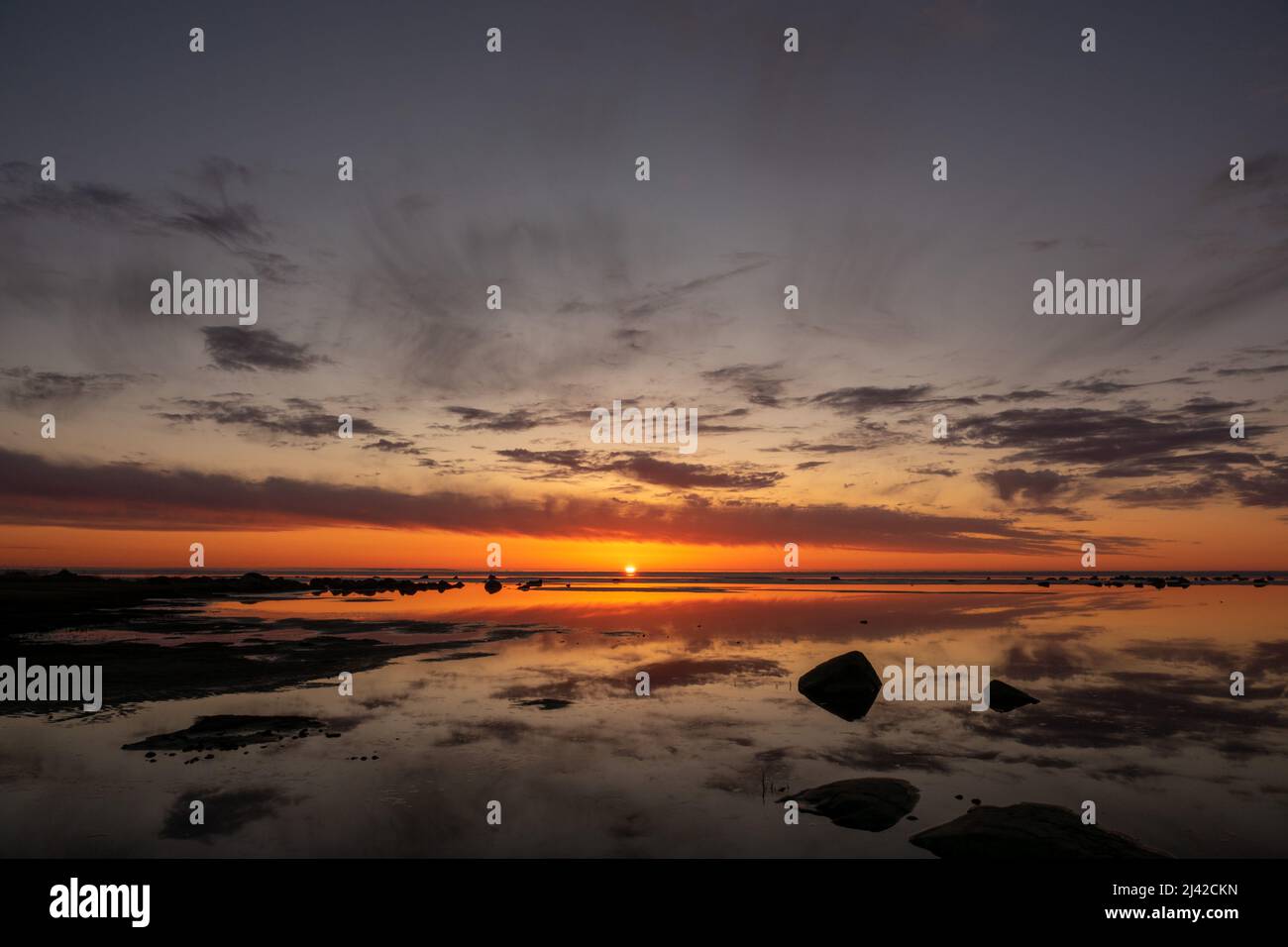 Beautiful sunset at seaside Stock Photo - Alamy
