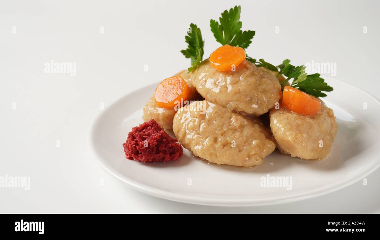 Gefilte fish with carrot. Plate of traditional Passover Pesach gefilte ...