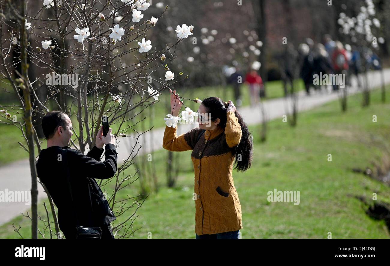 ZAPORIZHZHIA, UKRAINE - APRIL 10, 2022 - A man takes a picture of a ...