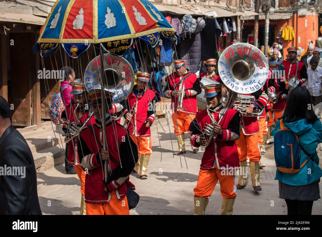 Kathmandu, Nepal- March 20,2022 : The wedding procession passes through ...