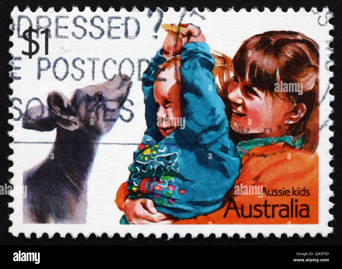 AUSTRALIA - CIRCA 1987: a stamp printed in the Australia shows Playing ...