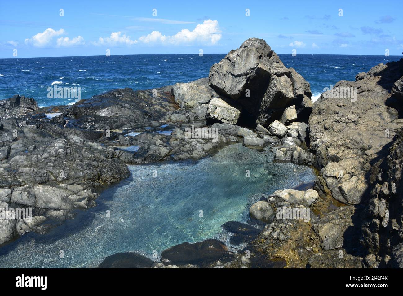 Beautiful peaceful hidden natural pool along the rugged coast of Aruba ...