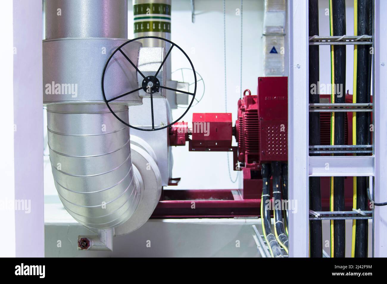 Wheel and pipe Stock Photo - Alamy