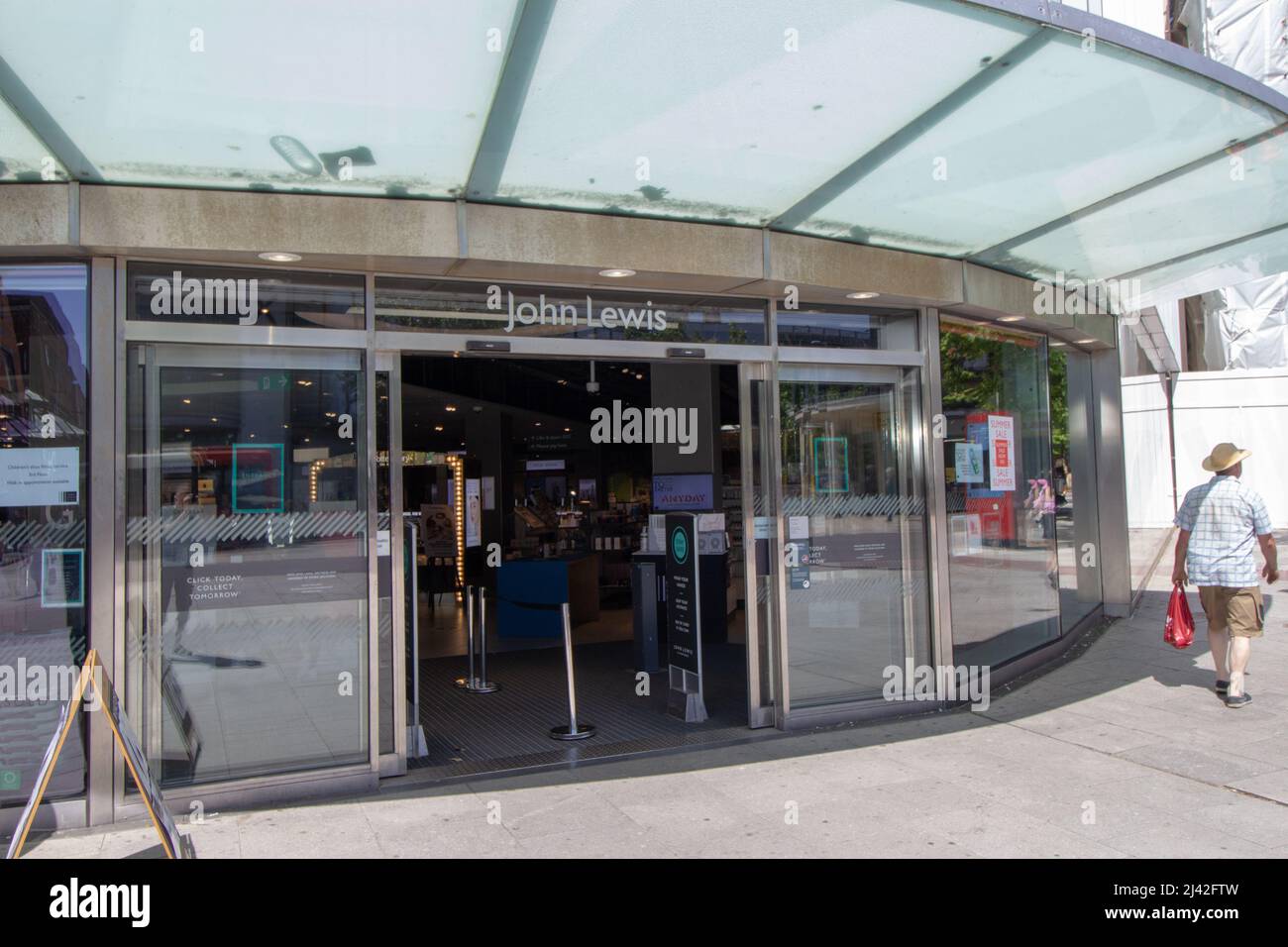 EXETER, UK - JULY 18, 2021 detail of entrance to a branch of John Lewis ...