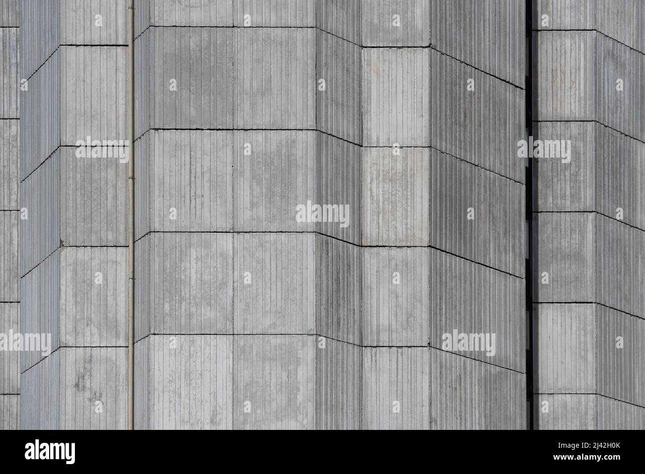 Close-up of grey rough surface concrete facade of brutalist ...