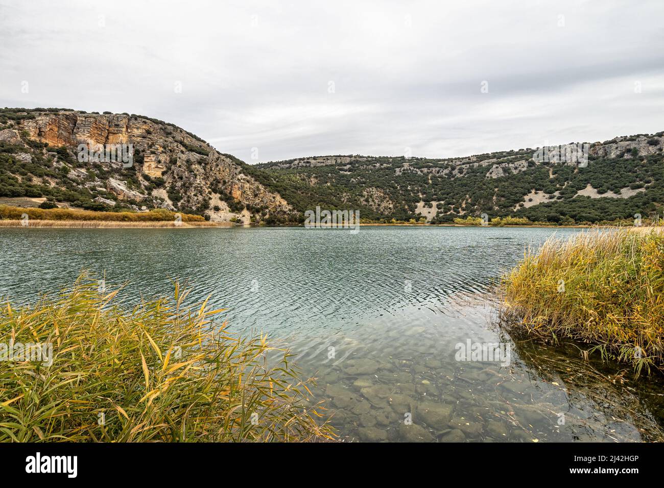 Landscape of karstic cliffs in large lagoon of Tobar in Beteta, Cuenca ...