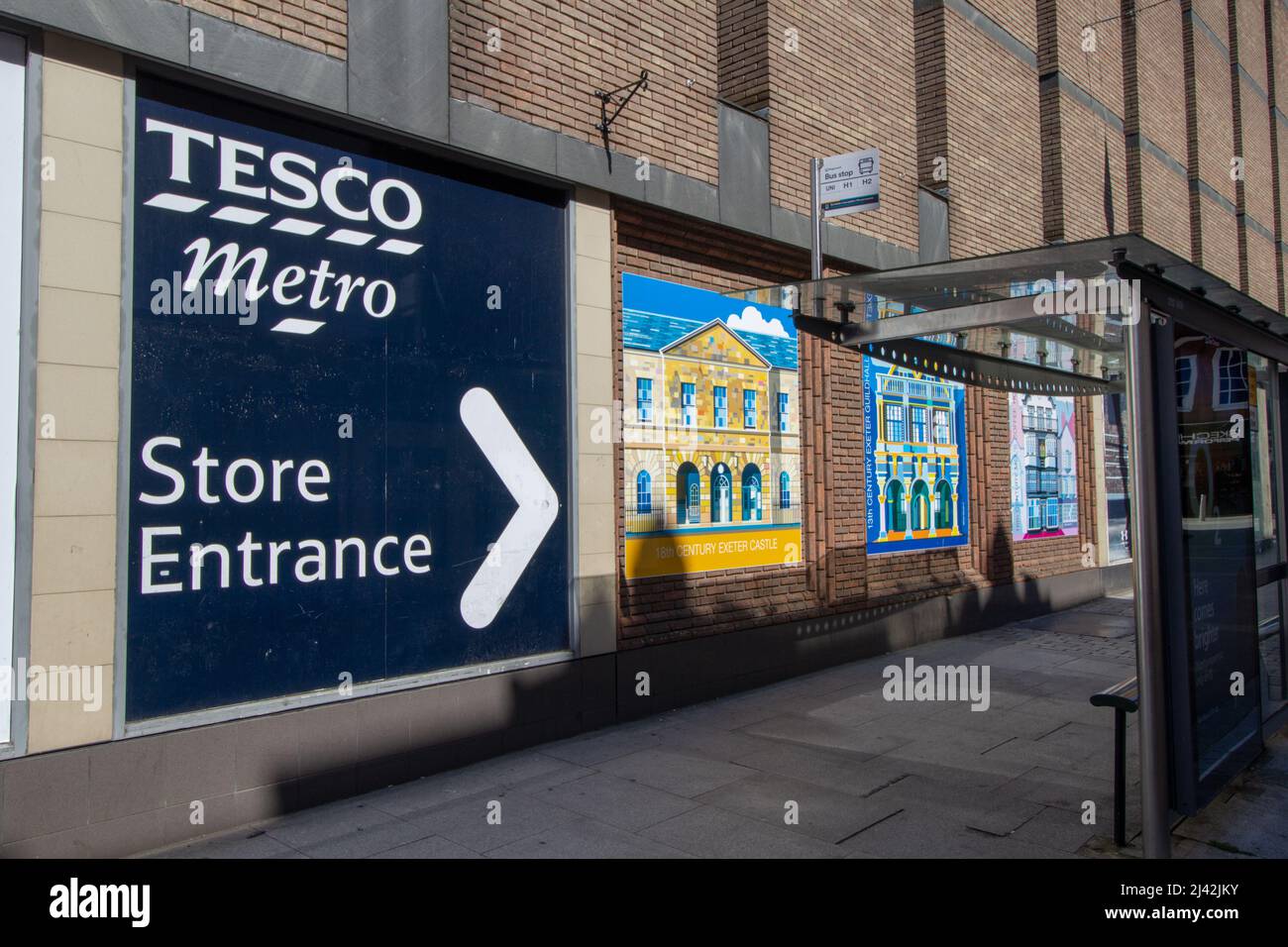 EXETER, UK - JULY 18, 2021 signage for store entrance to a branch of ...