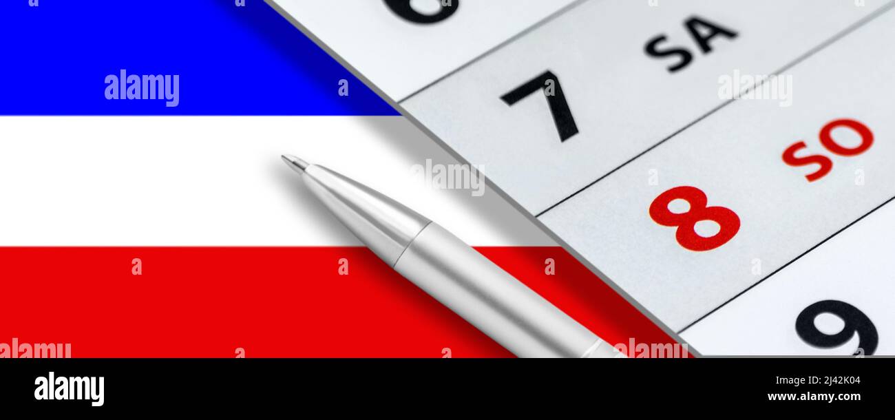 German calendar 2022 May 8 Sunday and flag of Schleswig-Holstein Stock ...